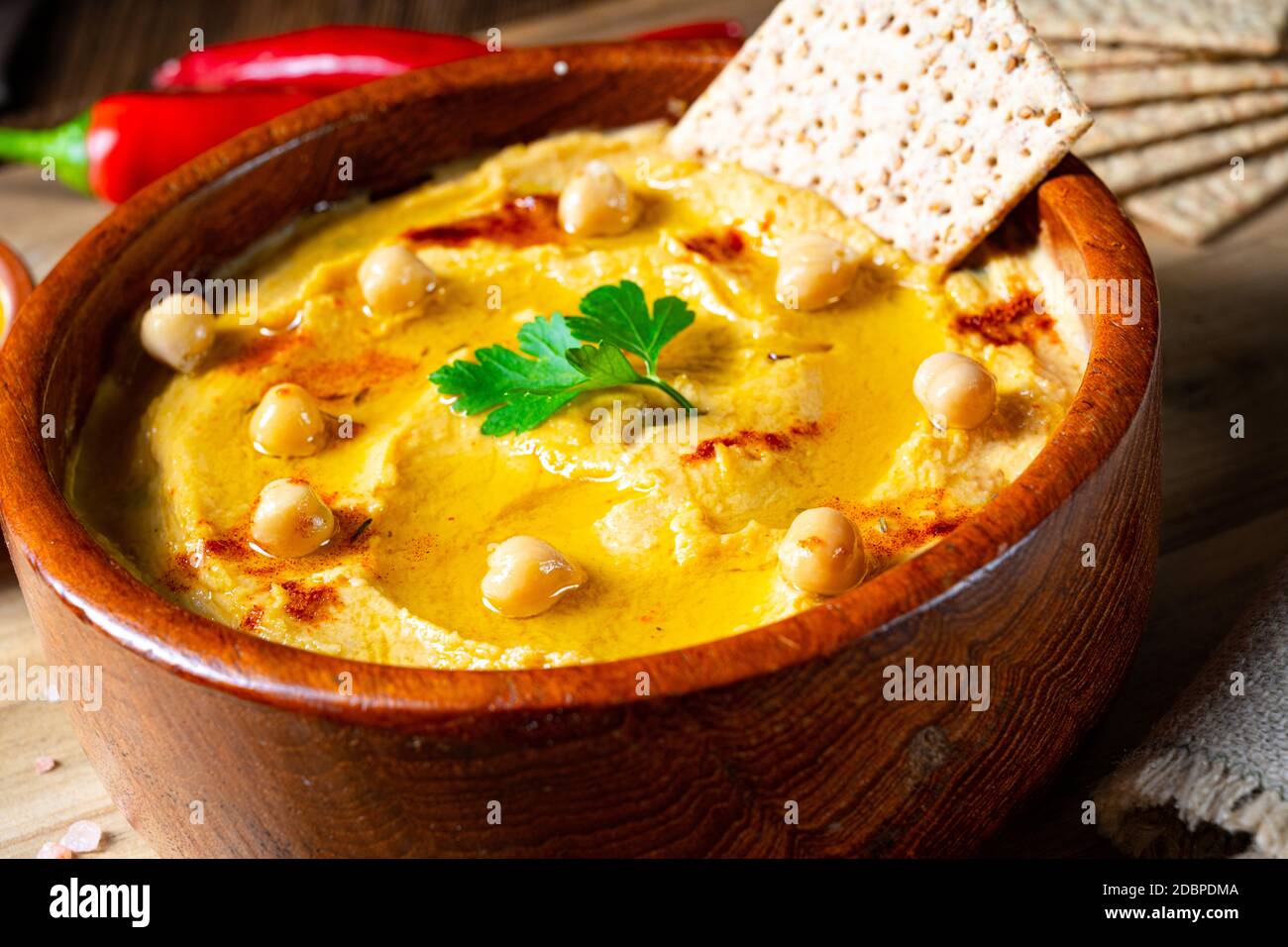 Delicious hummus paste with lemon and chilli Stock Photo - Alamy