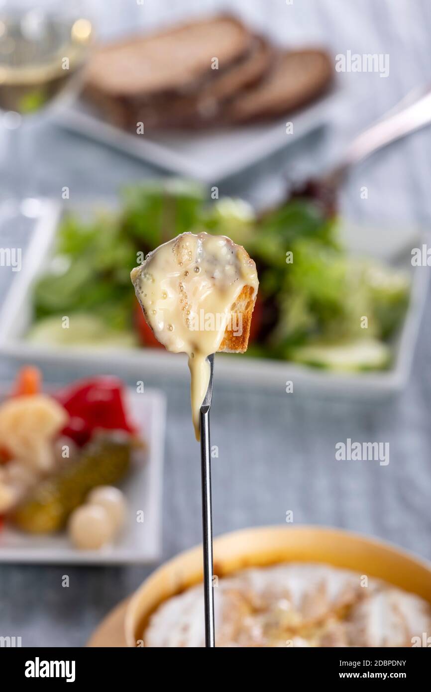 swiss cheese fondue with bread Stock Photo - Alamy
