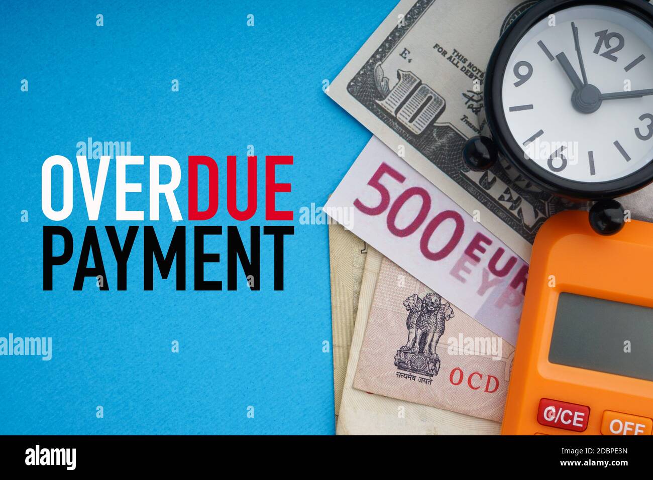 OVERDUE PAYMENT text with alarm clock, banknotes currencies and ...
