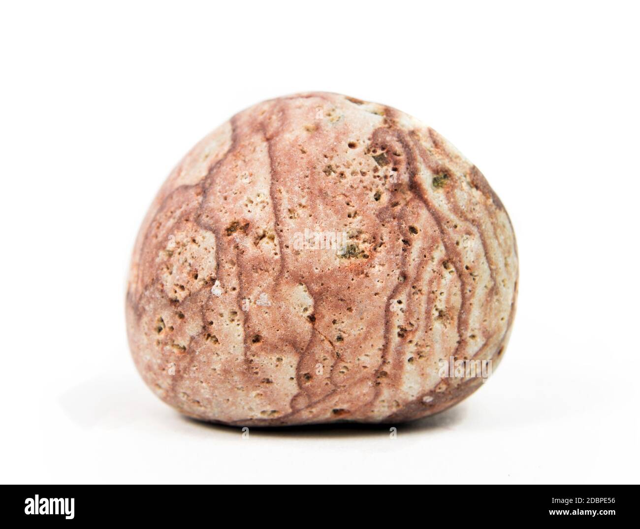Stone from the sea on white Stock Photo - Alamy