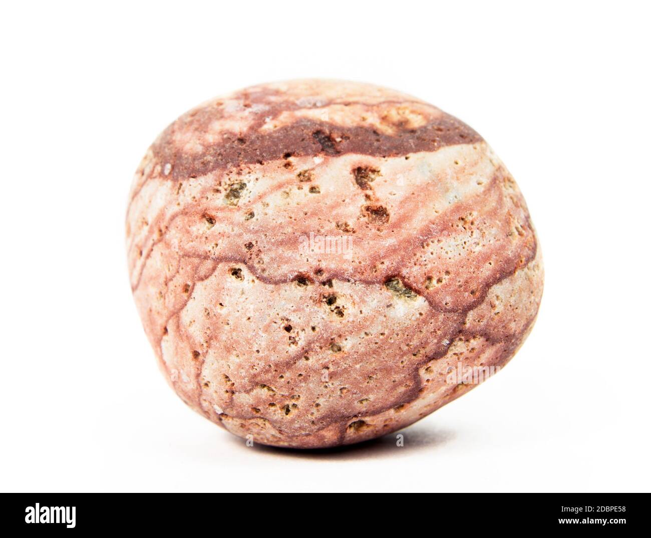 Stone from the sea on white Stock Photo - Alamy