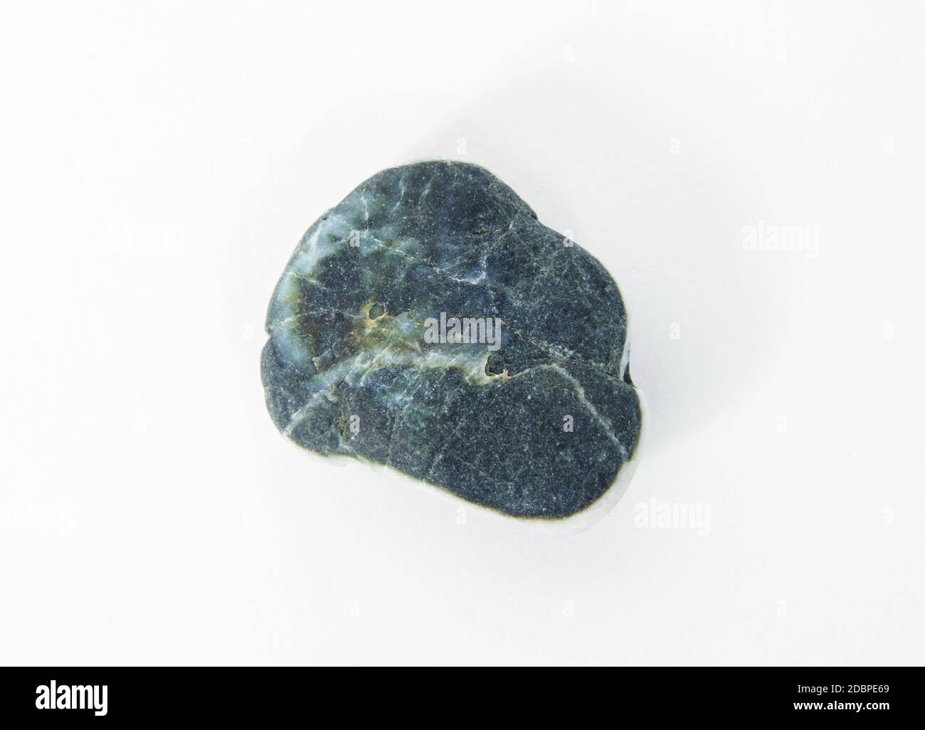 Stone from the sea on white Stock Photo - Alamy