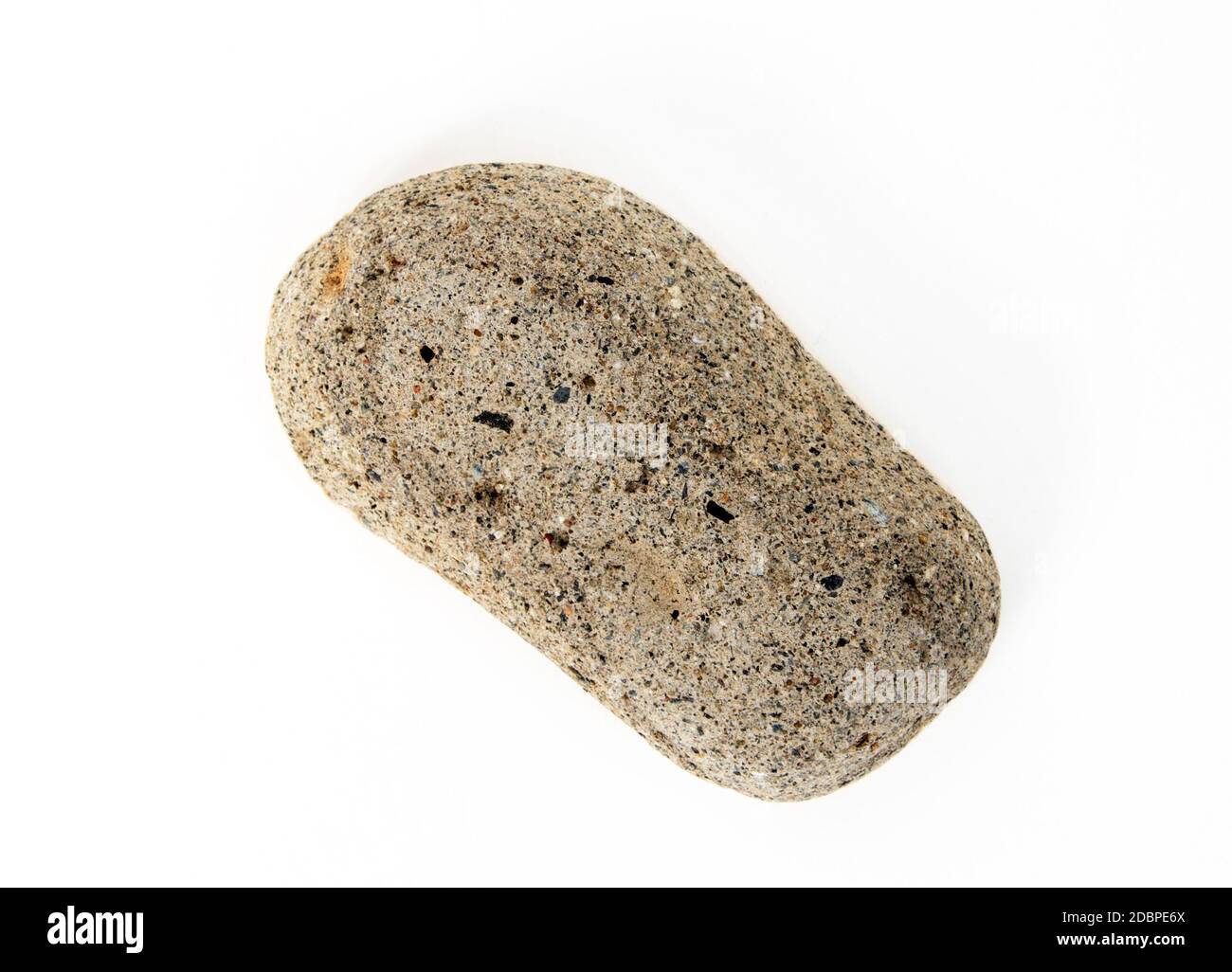 Stone from the sea on white Stock Photo - Alamy