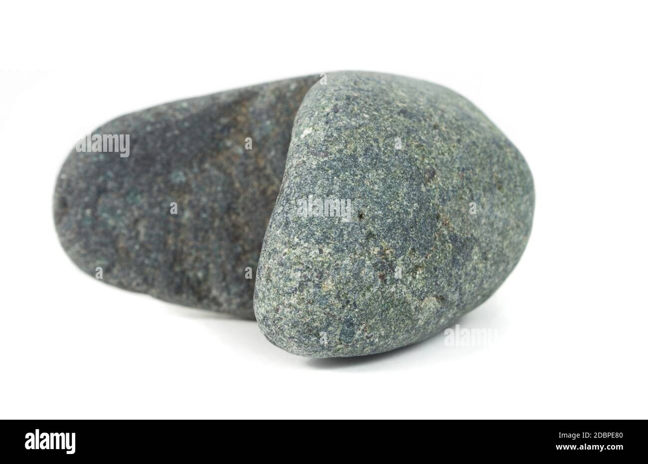 Stone from the sea on white Stock Photo - Alamy