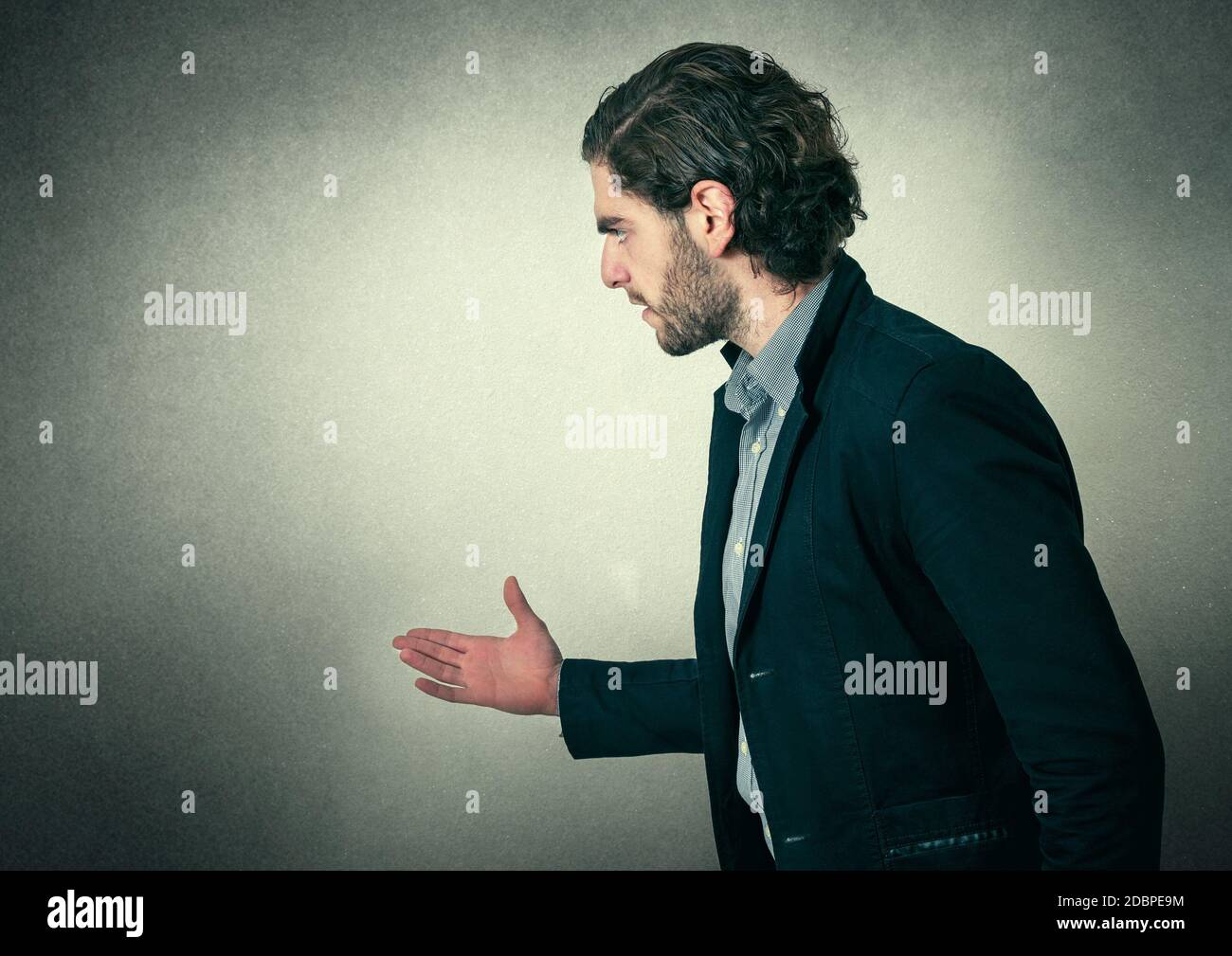 Bearded man with angry expression Stock Photo - Alamy