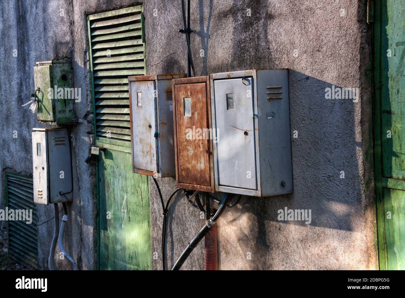 Old and rusty electricity boxes outdoors Stock Photo - Alamy