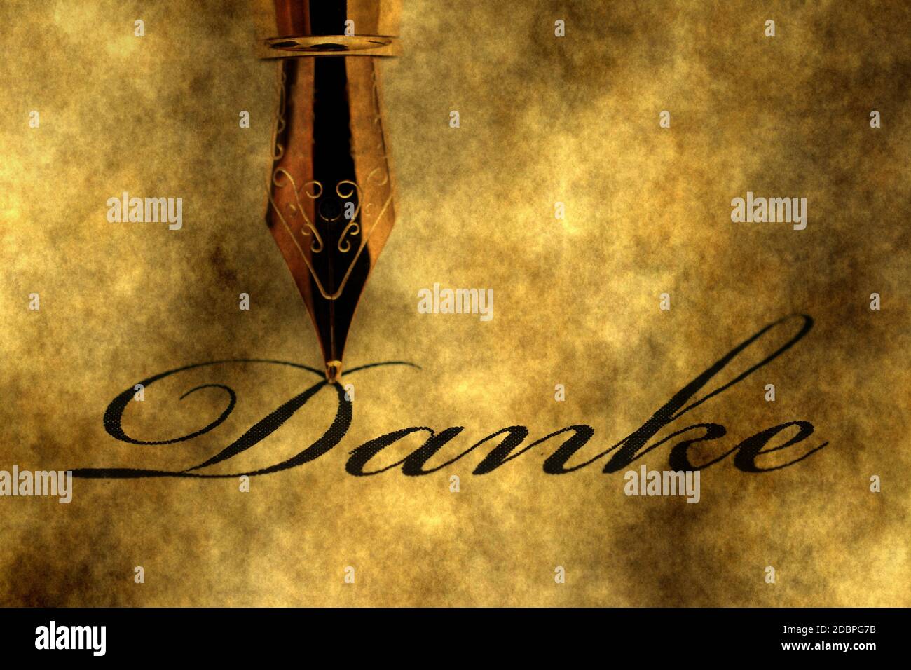 Fountain pen on danke text Stock Photo - Alamy