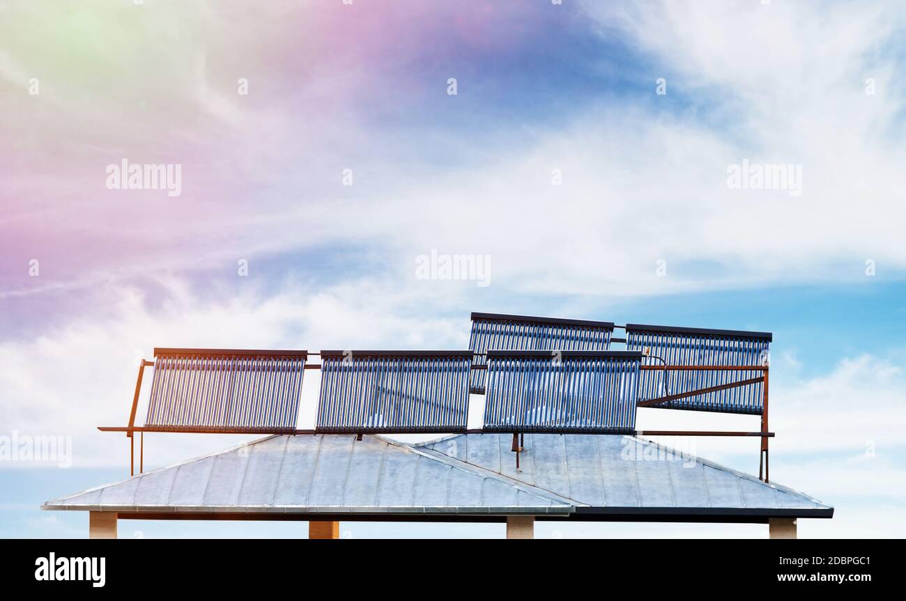 Solar batteries on the house roof Stock Photo - Alamy