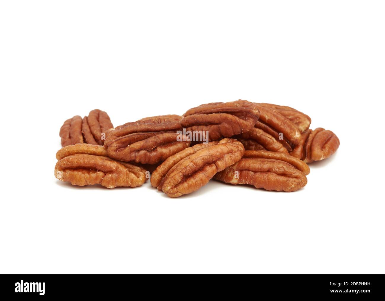 heap of peeled pecans isolated on a white background, close up Stock ...