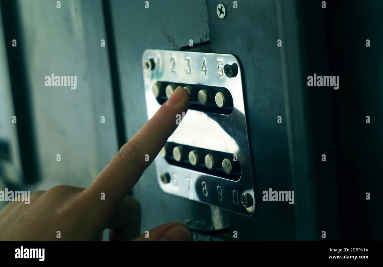 Applying security code on the door Stock Photo - Alamy