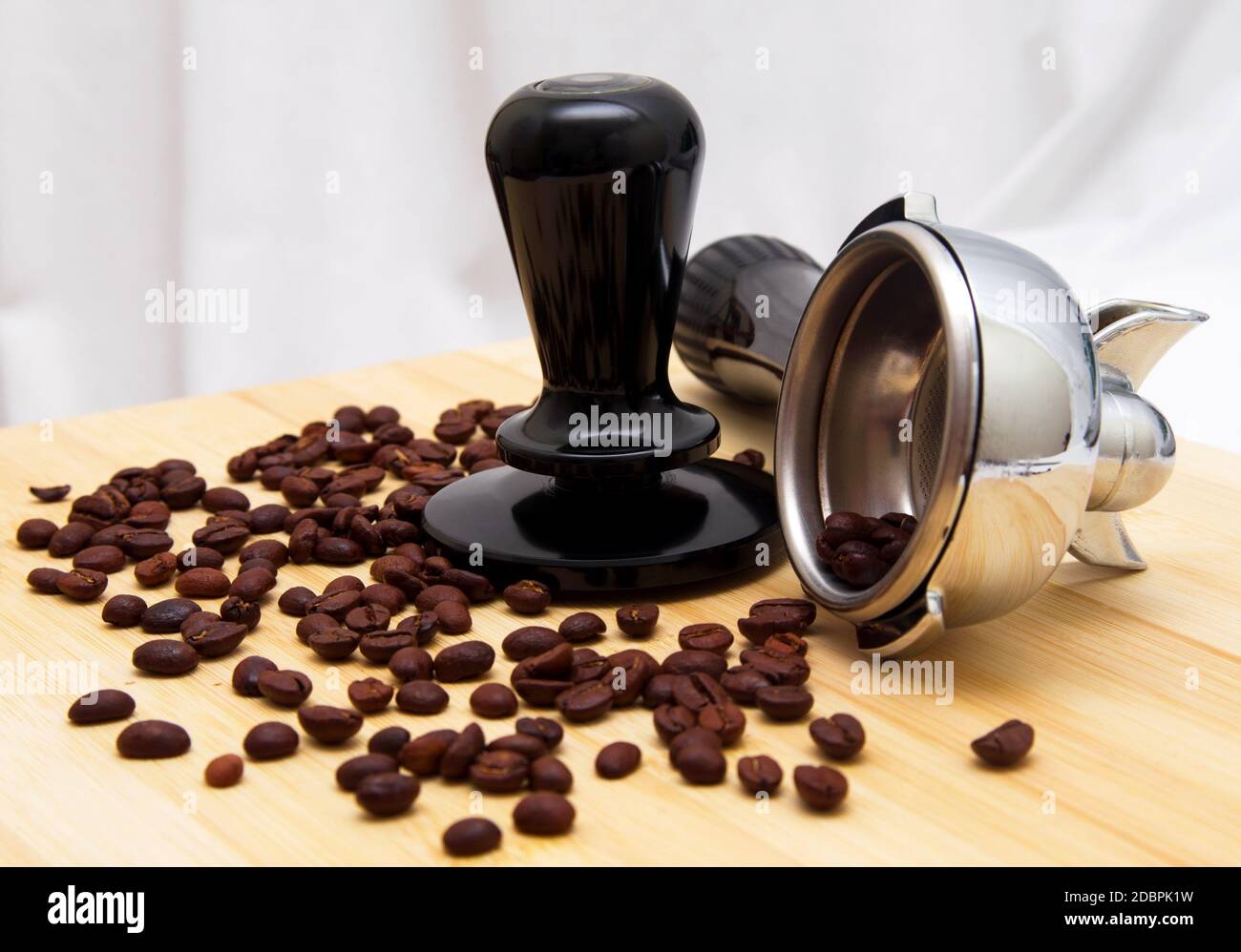 Grinder and filter for the coffee making Stock Photo - Alamy