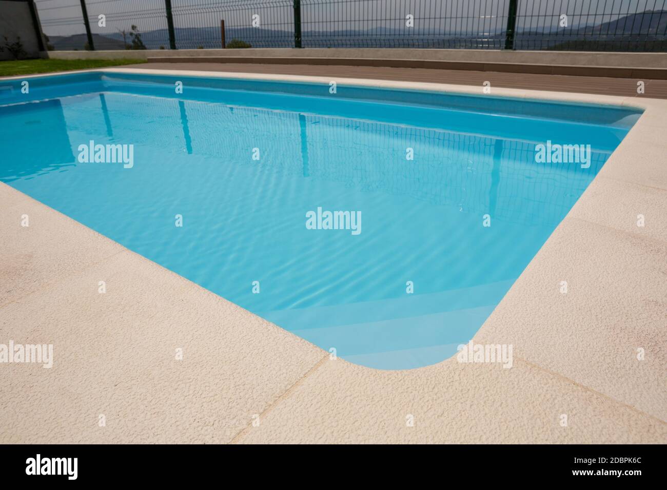 swimming pool with blue water Stock Photo - Alamy