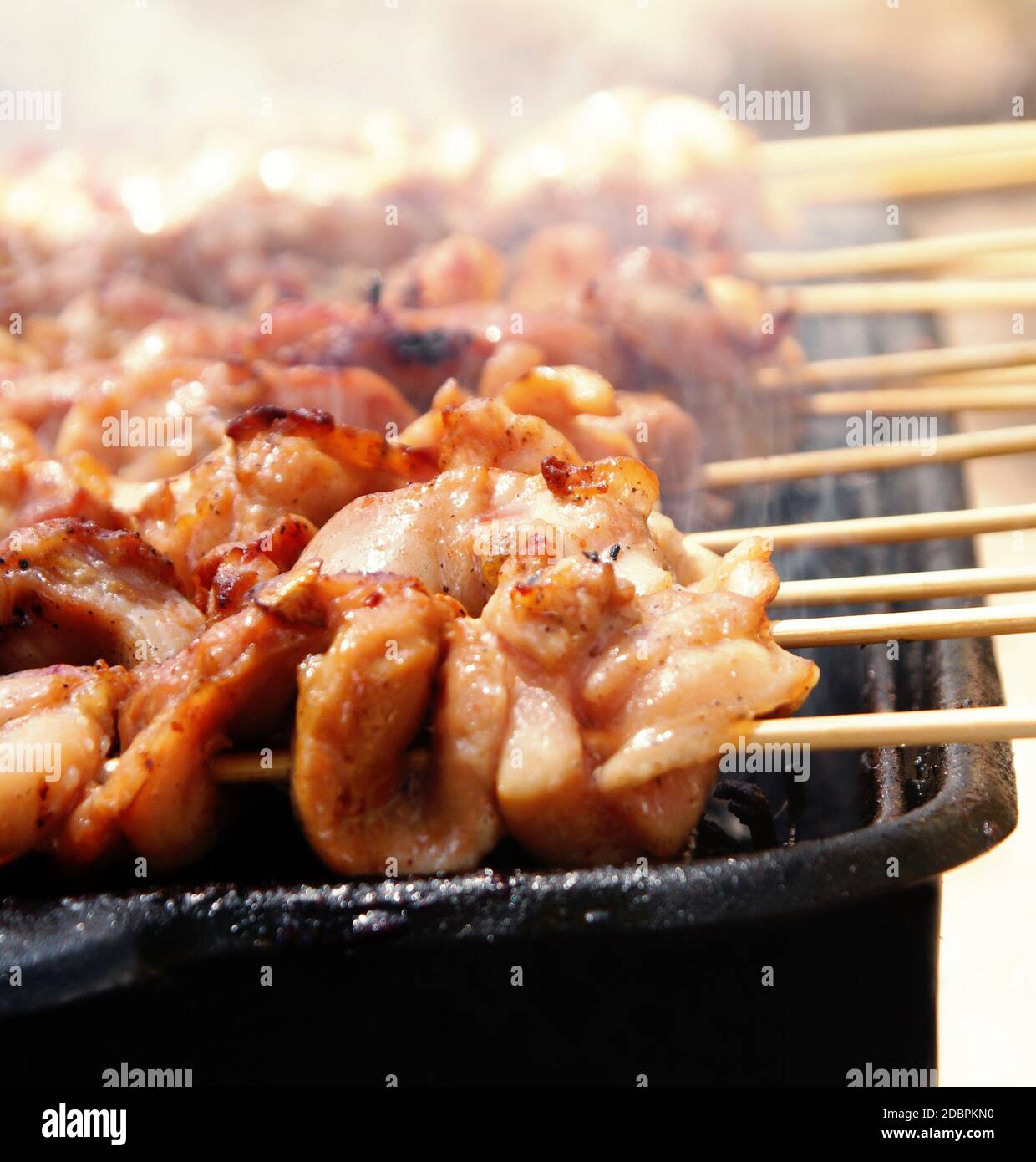 Making BBQ closeup outdoors Stock Photo - Alamy