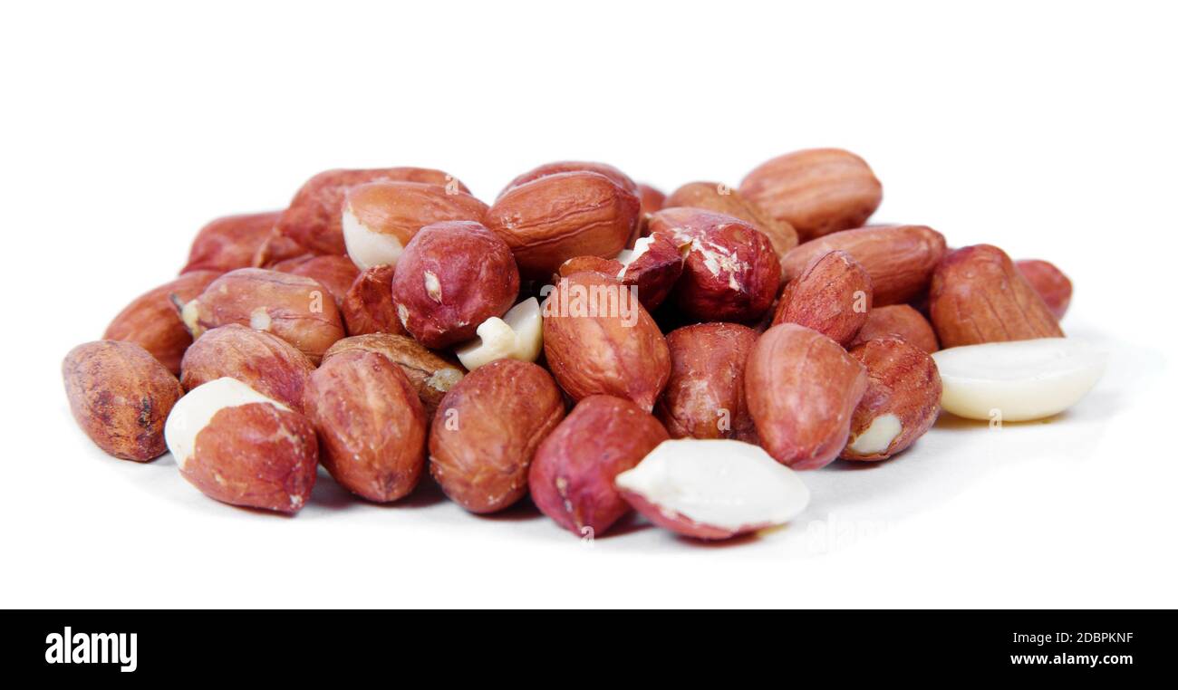 Peanuts closeup on white Stock Photo - Alamy