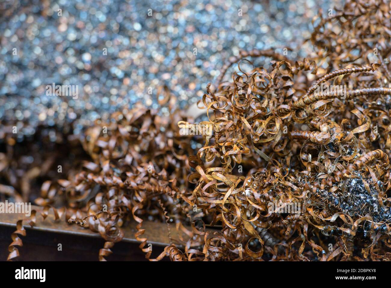 Steel scrap materials recycling. waste after machining metal parts on a ...