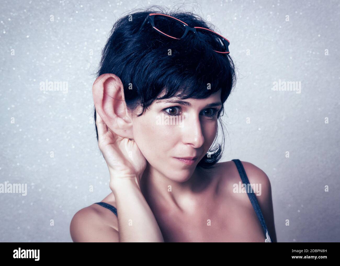 Funny woman with the big ear Stock Photo - Alamy