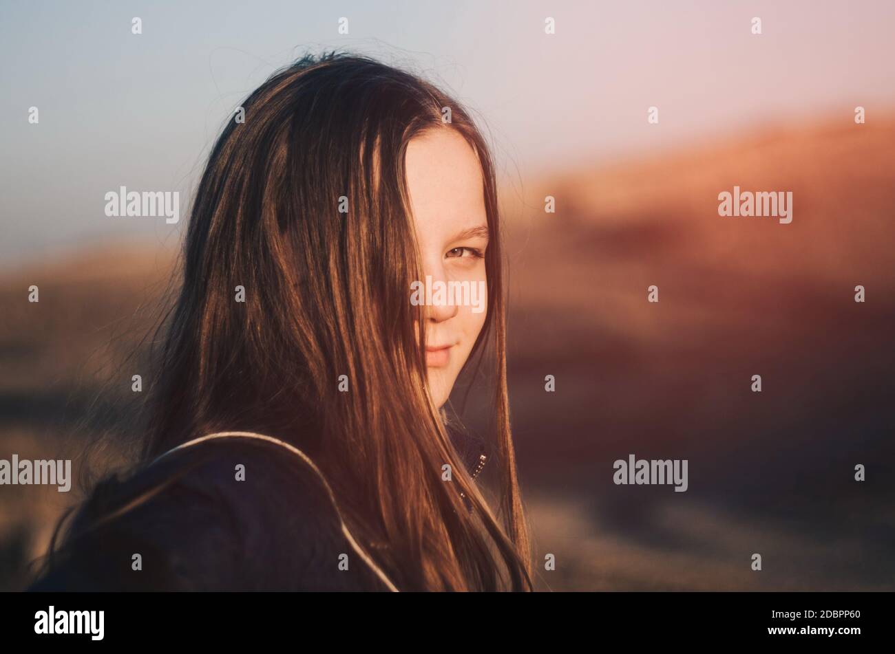 Young girl outdoor portrait in sunlight Stock Photo - Alamy