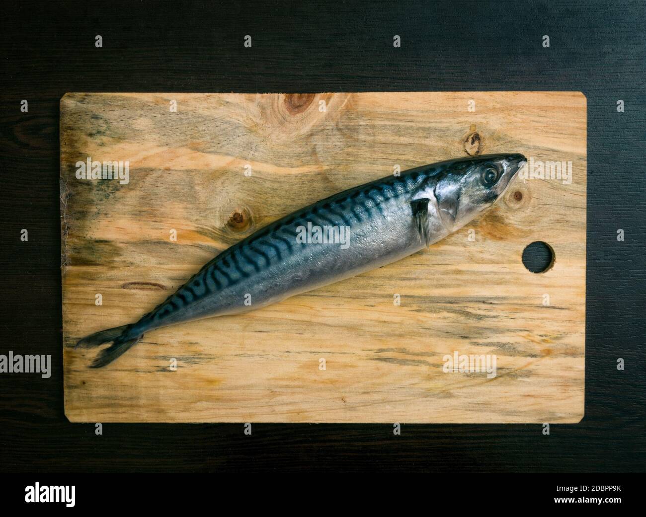 Mackerel fish on the table Stock Photo - Alamy