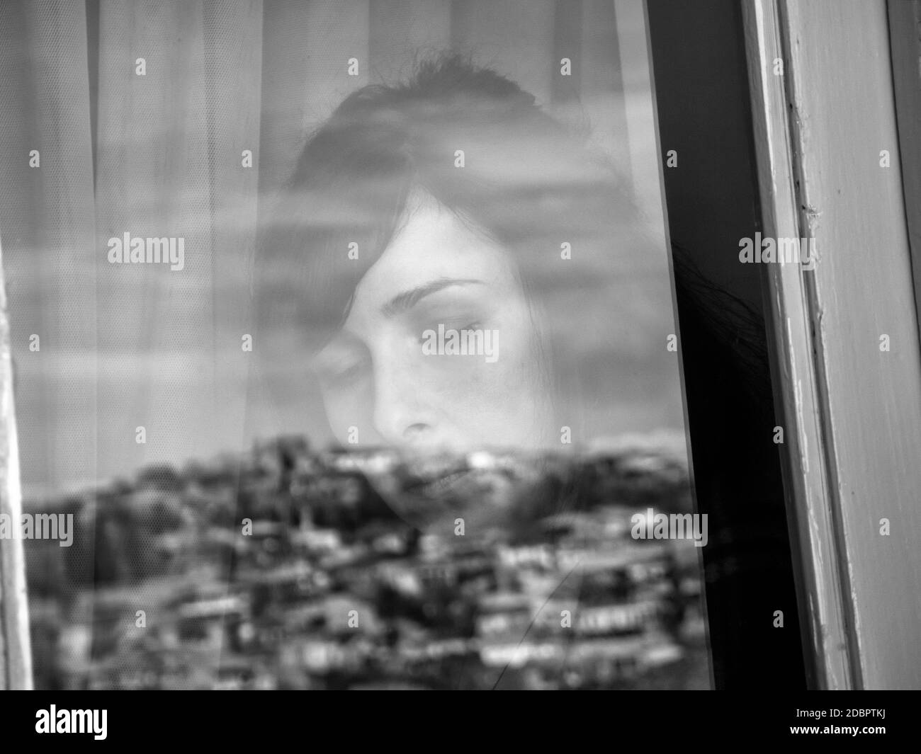 Girl reflection in window in the town Stock Photo - Alamy