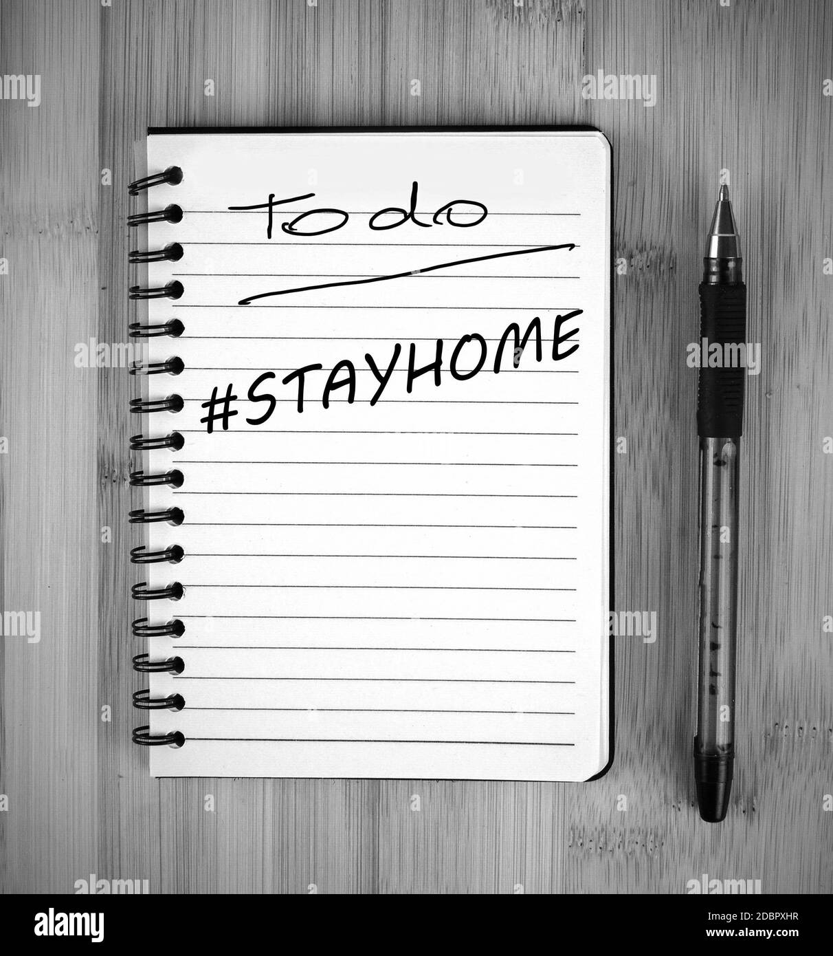 Note paper saying stay at home Stock Photo - Alamy