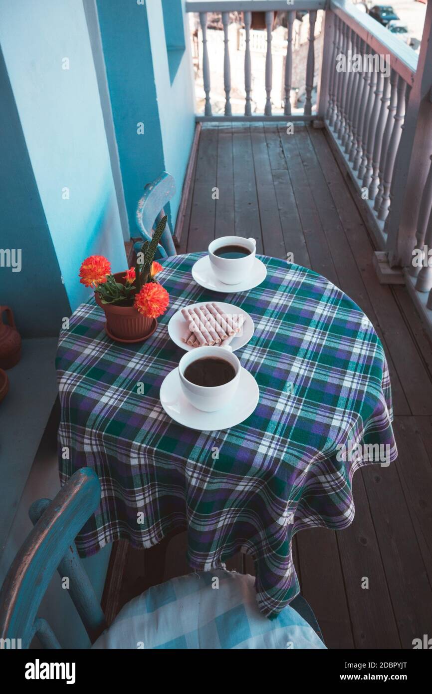 Cups of coffee on the balcony Stock Photo - Alamy