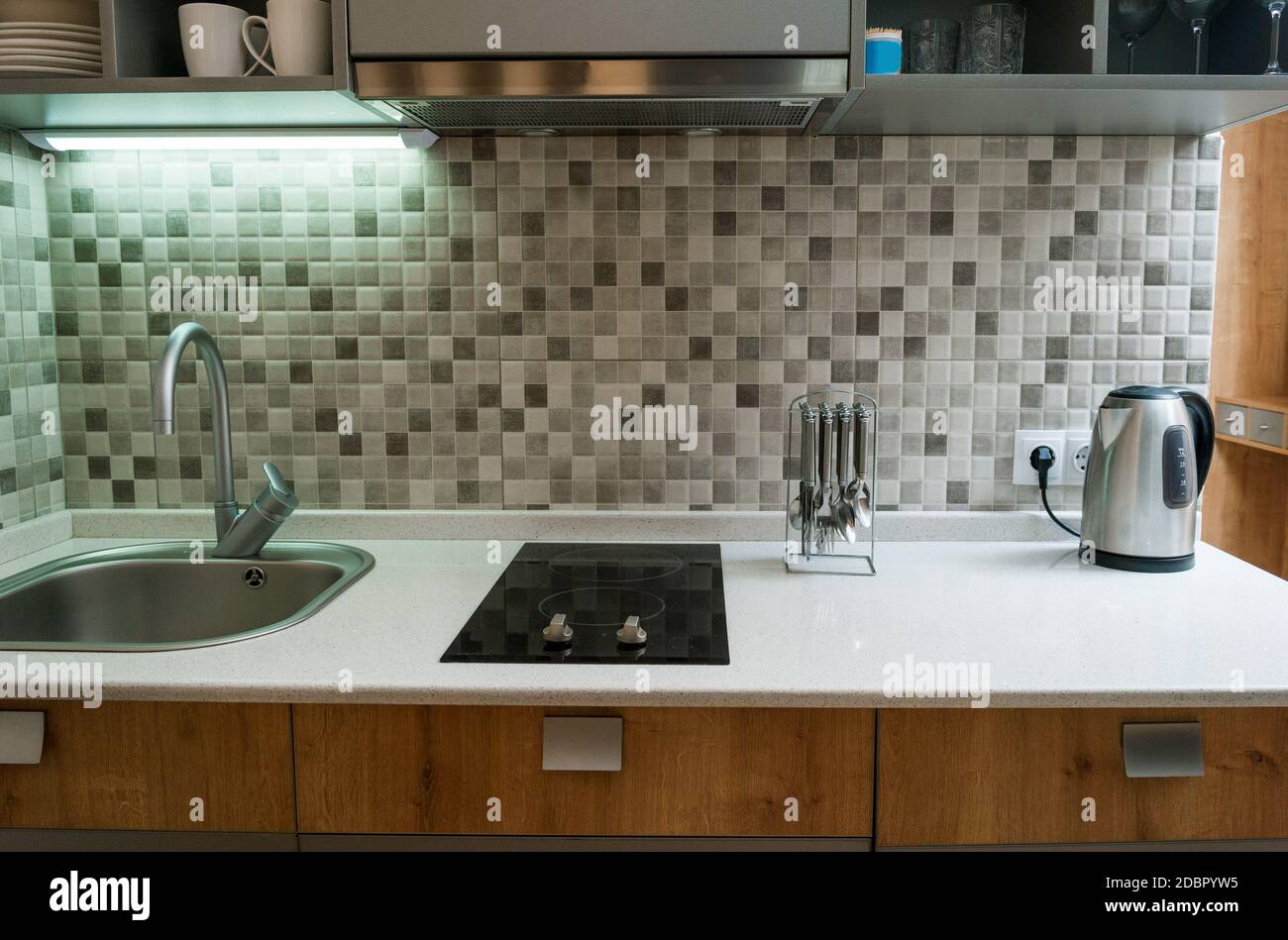 Interior of modern studio room kitchen Stock Photo - Alamy