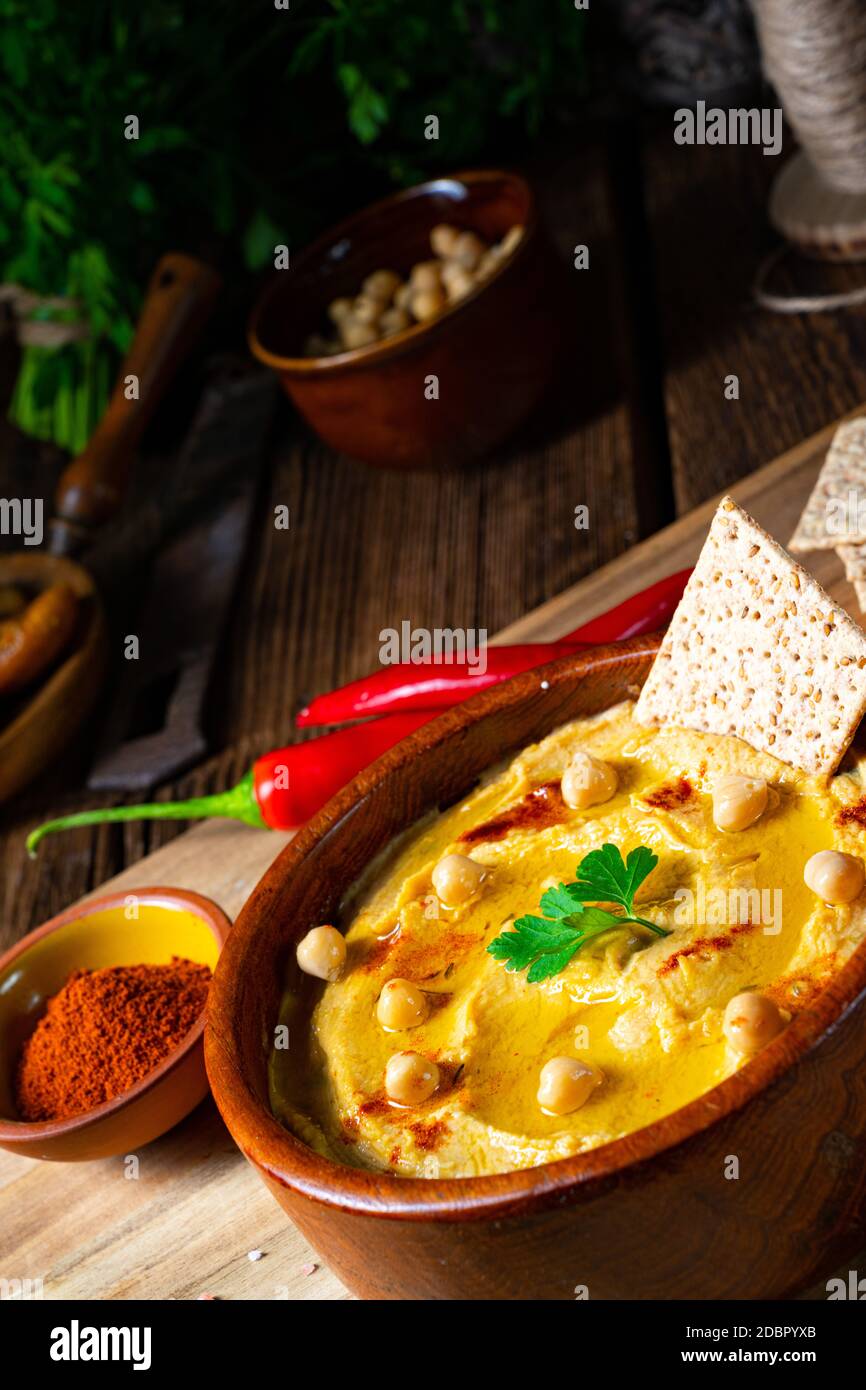Delicious hummus paste with lemon and chilli Stock Photo - Alamy