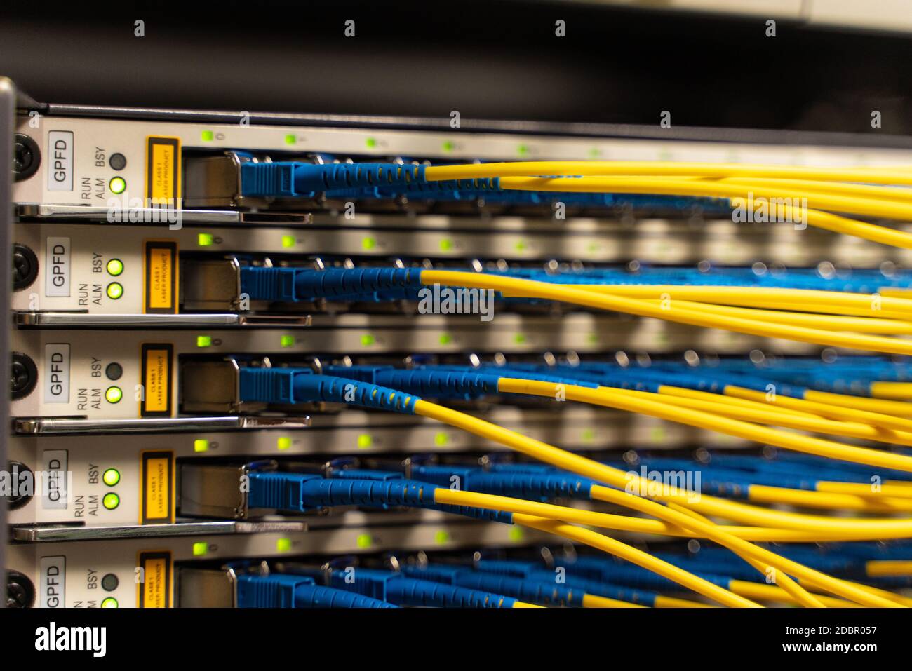 Cables connected to servers in a cables room Stock Photo - Alamy