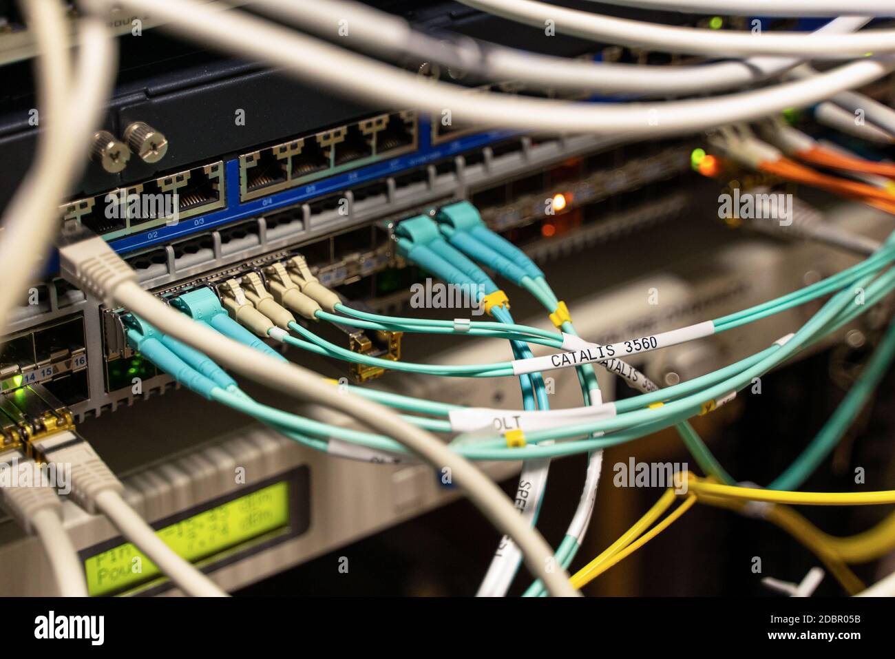 Cables connected to servers in a cables room Stock Photo - Alamy
