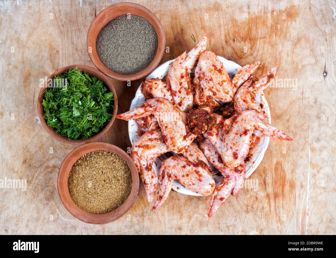 Spice powder chicken wings hi-res stock photography and images - Alamy