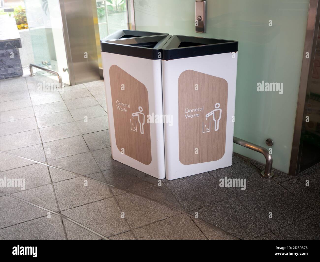 recycling bin at shopping mall, trash container with icons of recycle ...