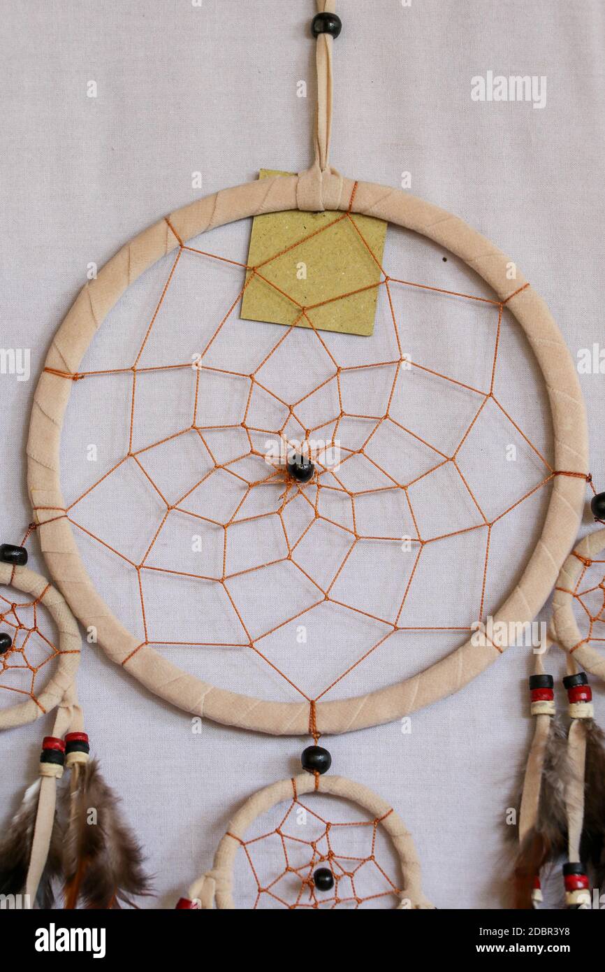 Real native dream catcher on pure white background Stock Photo - Alamy
