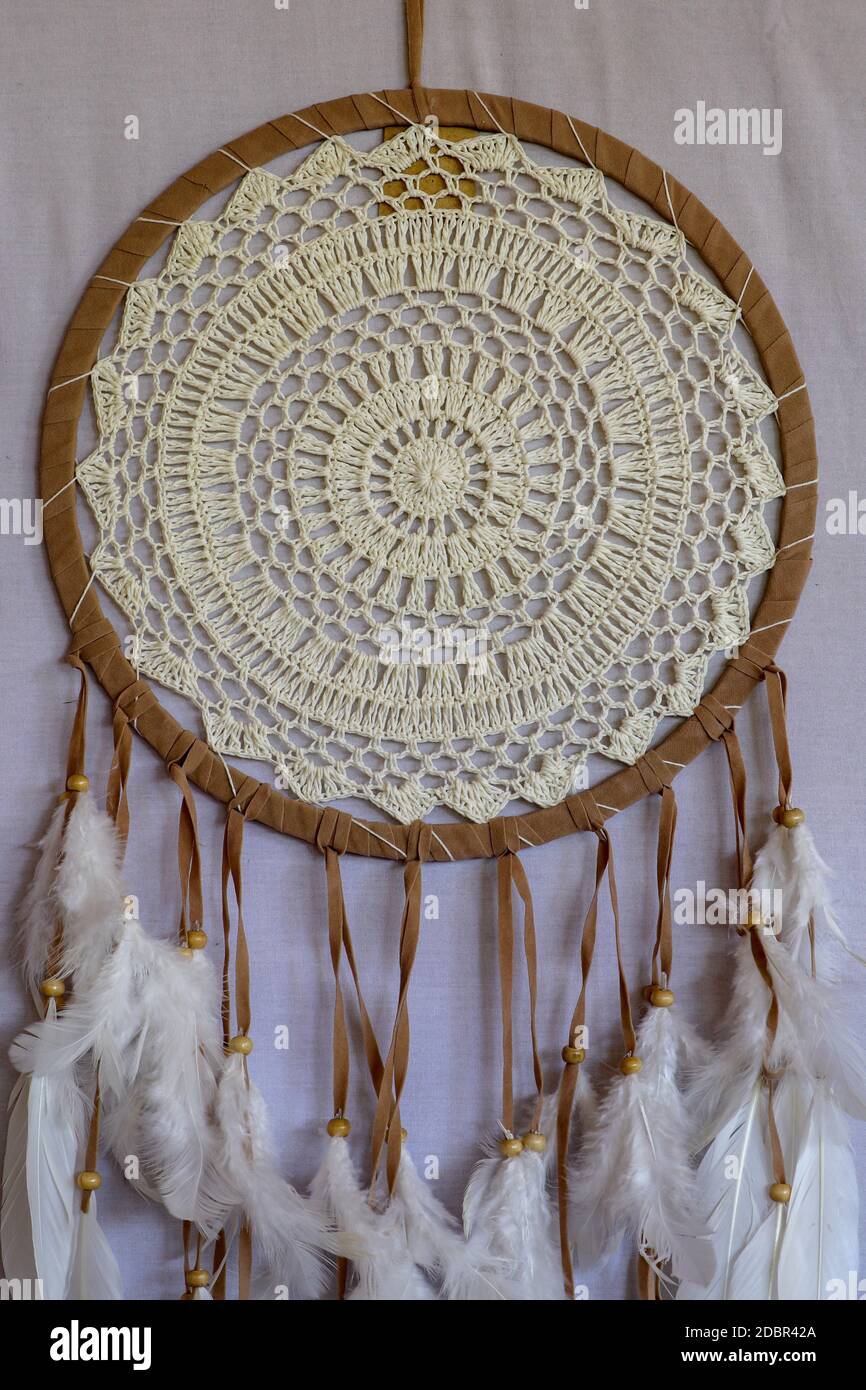 White color dream catcher with white feathers in the interior. Home ...
