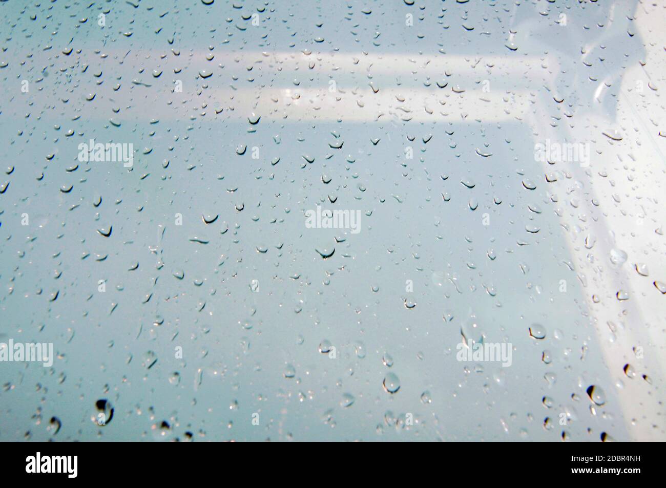 Rain drops running down window hi-res stock photography and images - Alamy