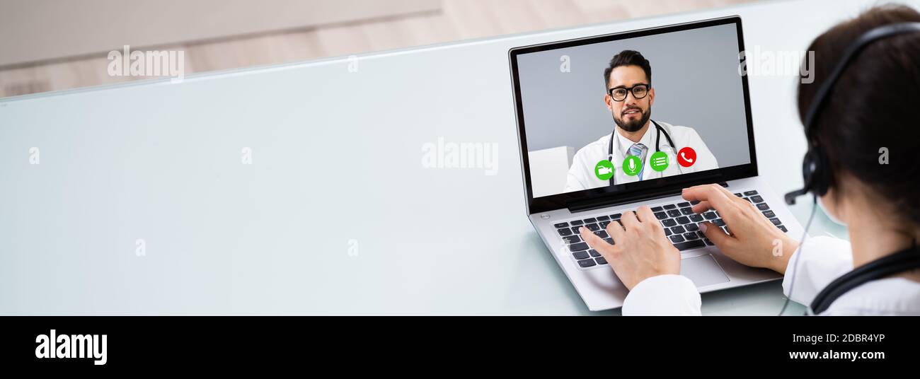 Medical Doctor Using Online Elearning Video Conference Technology Stock ...