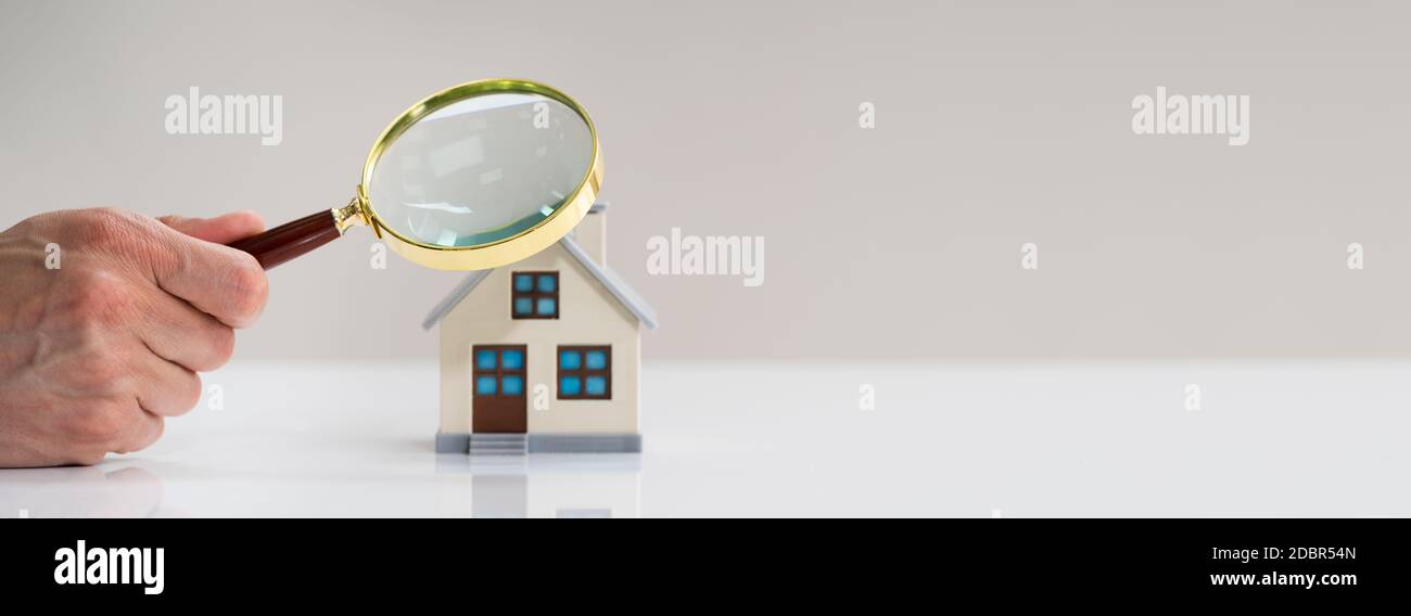 Home Inspection And House Appraisal Using Magnifying Glass Stock Photo ...