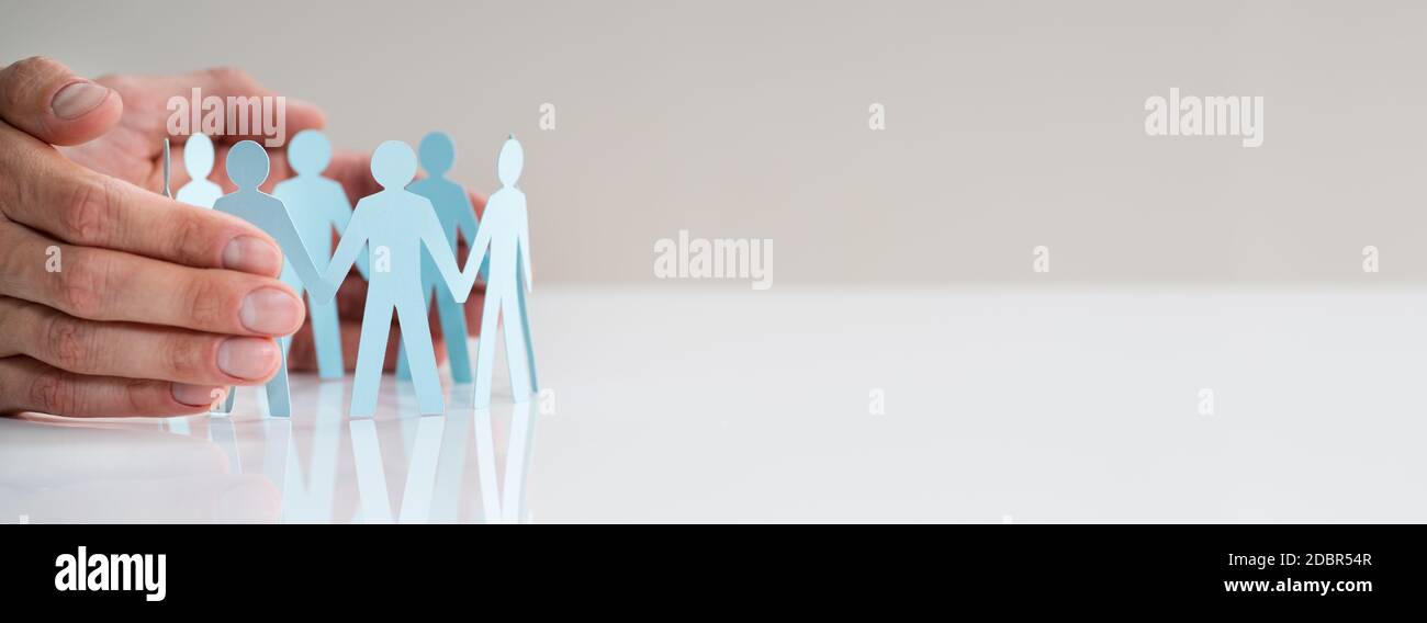 Boss Protecting Business Employees. Safety And Security Stock Photo - Alamy