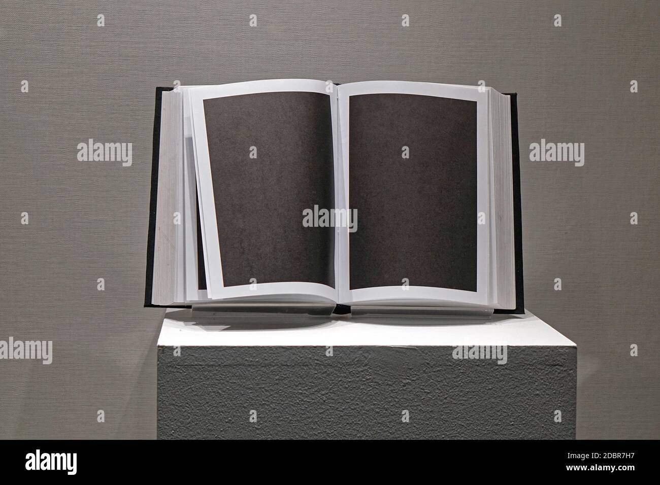 Open empty book with printed black pages Stock Photo - Alamy