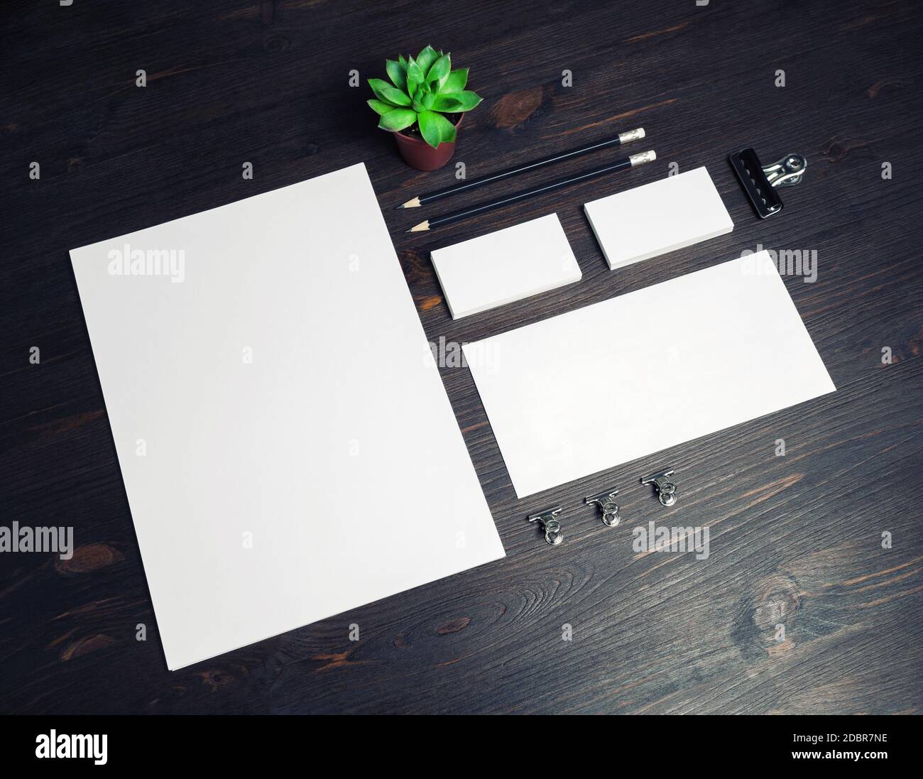 Branding stationery mockup on wood table background. Blank objects for ...