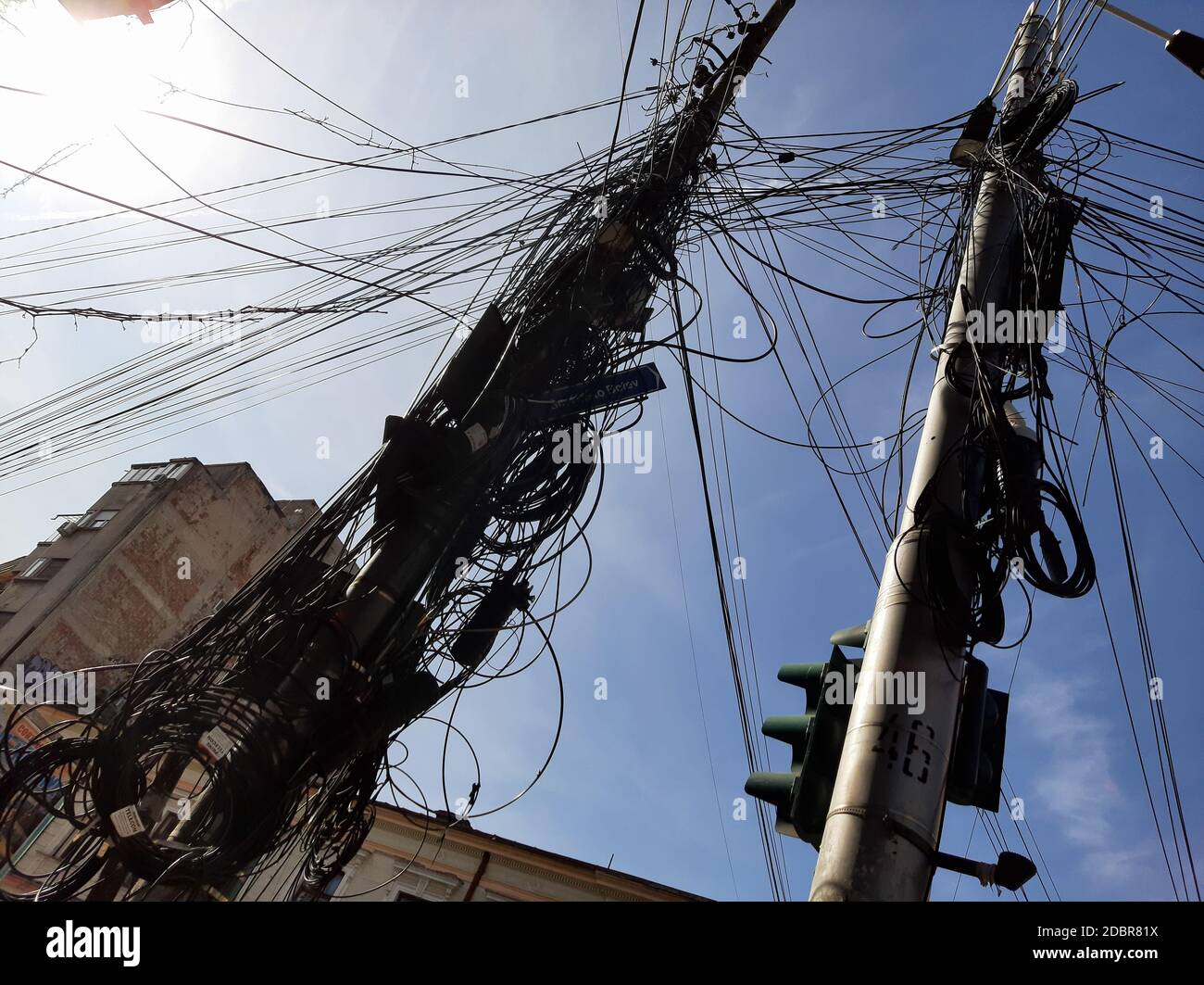Messy electrical cables on pole hi-res stock photography and images - Alamy
