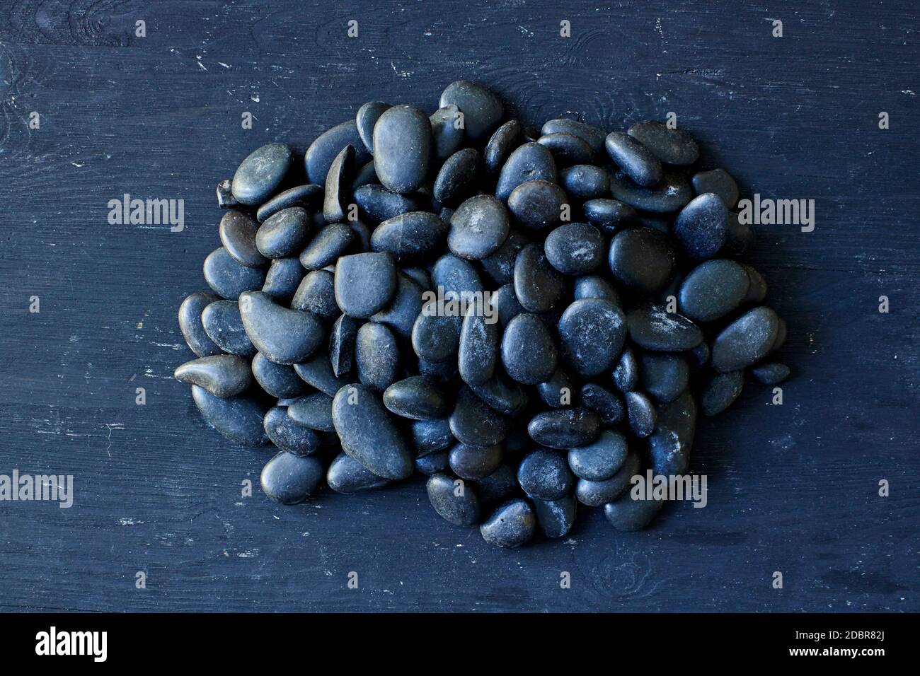 A studio photo of black river rocks Stock Photo - Alamy