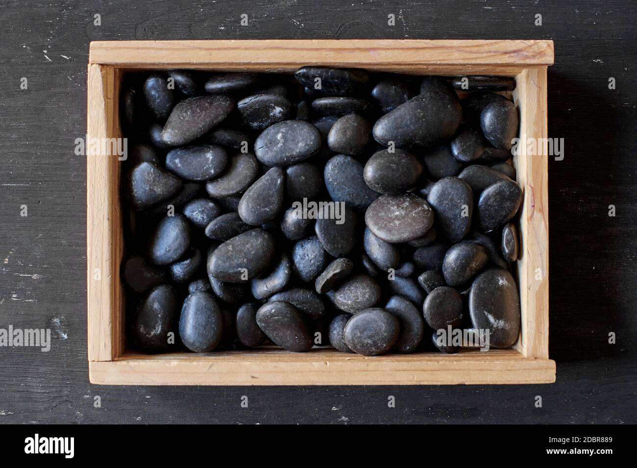 A studio photo of black river rocks Stock Photo - Alamy
