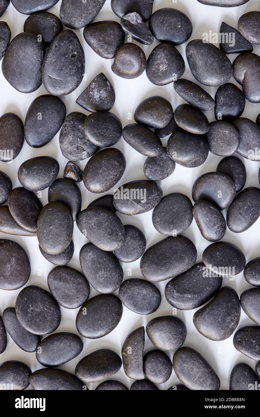 A studio photo of black river rocks Stock Photo - Alamy