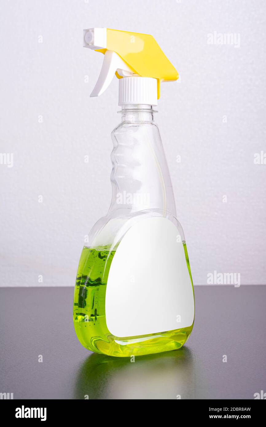 Cleaning liquid bottle in front of light gray background, editable mock ...