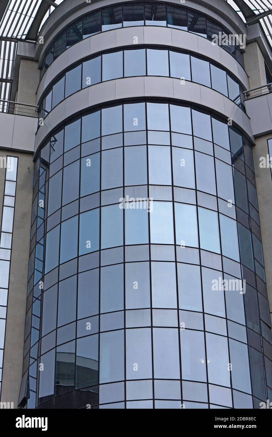 New modern round building with blue glass windows Stock Photo - Alamy