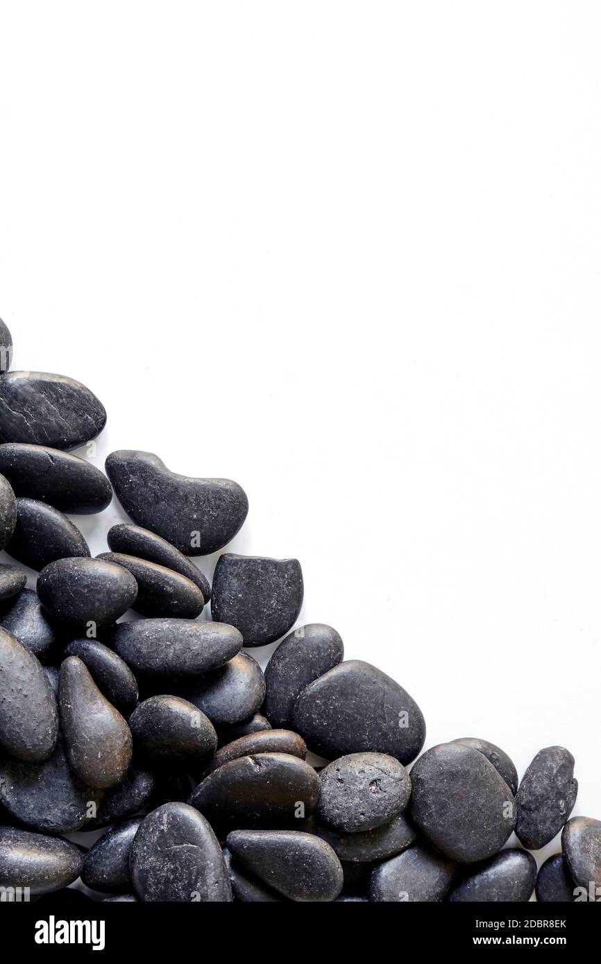A studio photo of black river rocks Stock Photo - Alamy