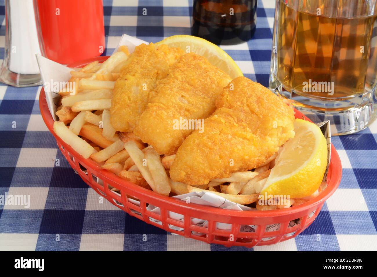 Fish wrapped in newspaper hi-res stock photography and images - Alamy