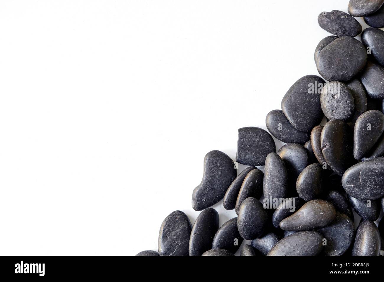 A studio photo of black river rocks Stock Photo - Alamy