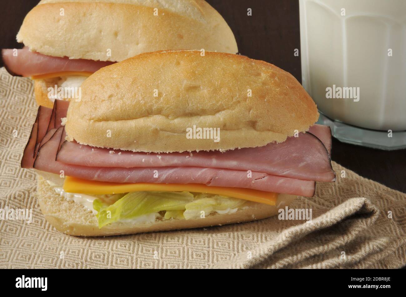 Ham sandwiches with cheese on mini buns Stock Photo - Alamy