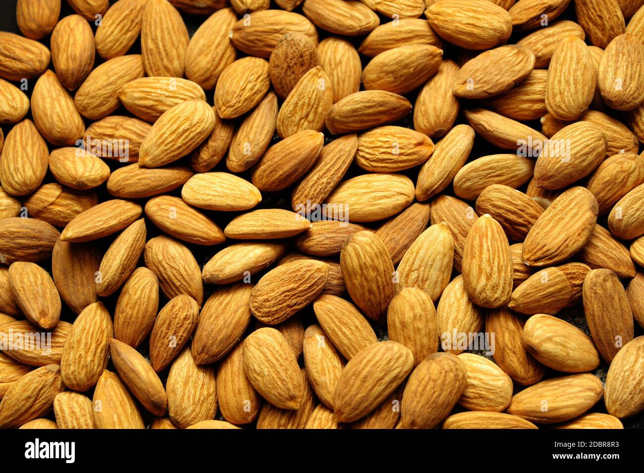 almonds close up background Stock Photo - Alamy